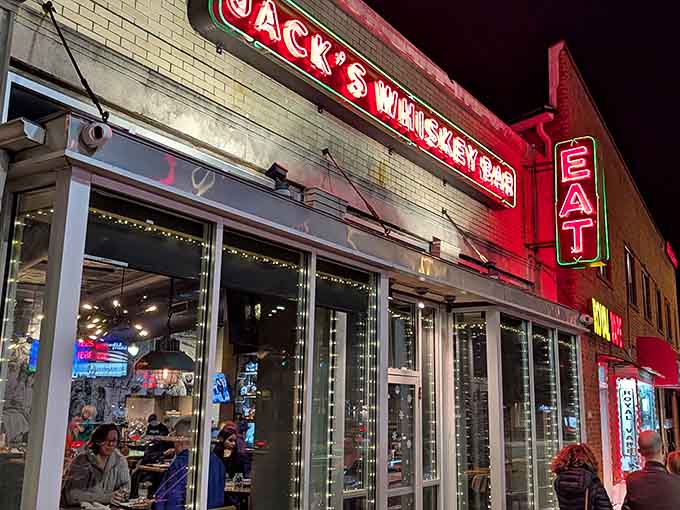 That glowing red neon sign isn't just calling you to dinner, it's practically singing a barbecue love song.