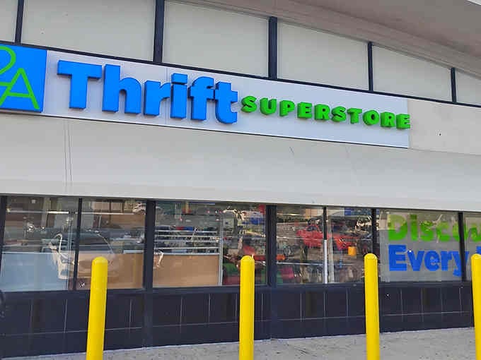 The bright blue and green signage practically shouts "come find treasures!" and honestly, who could resist that invitation?