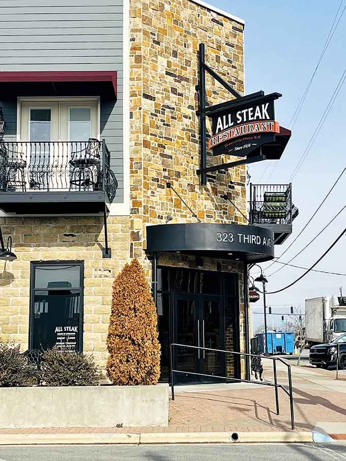 When the vintage sign glows against golden brick, you know generations have followed that beacon to beef perfection.