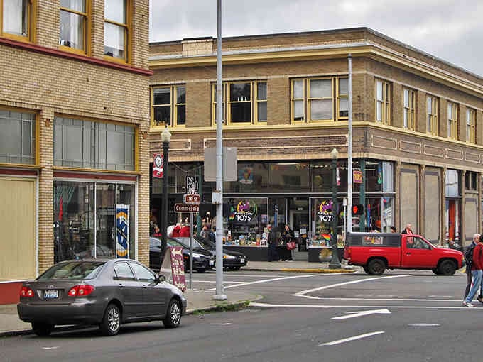 Classic storefronts line Astoria's streets where every building whispers stories from a century of coastal living.