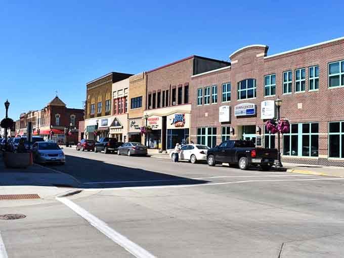 Modern meets historic where fresh sidewalks welcome neighbors gathering for coffee and conversation every morning.
