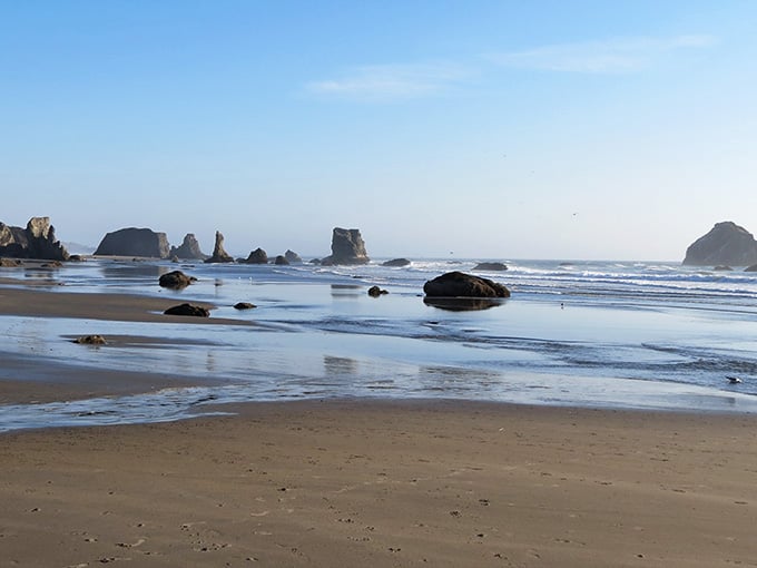 This scattered collection of sea stacks looks like nature's chess set abandoned mid-game on a giant sandy board.
