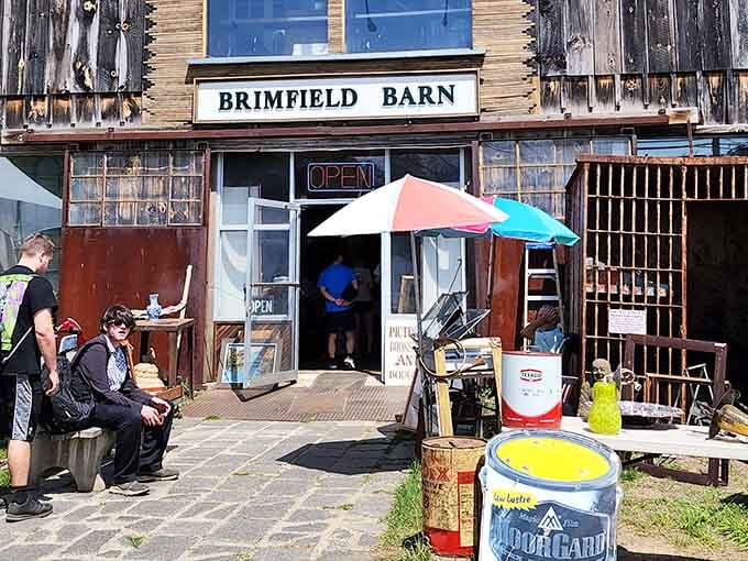 The weathered Brimfield Barn stands proud, its rustic charm promising antique adventures that would make any collector's heart skip.