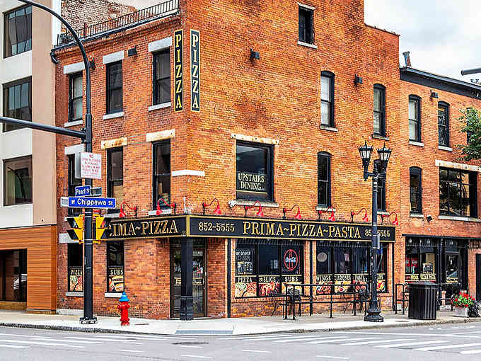 That classic brick pizza joint proves Buffalo's food scene goes way beyond wings, serving authentic Italian comfort on every plate.