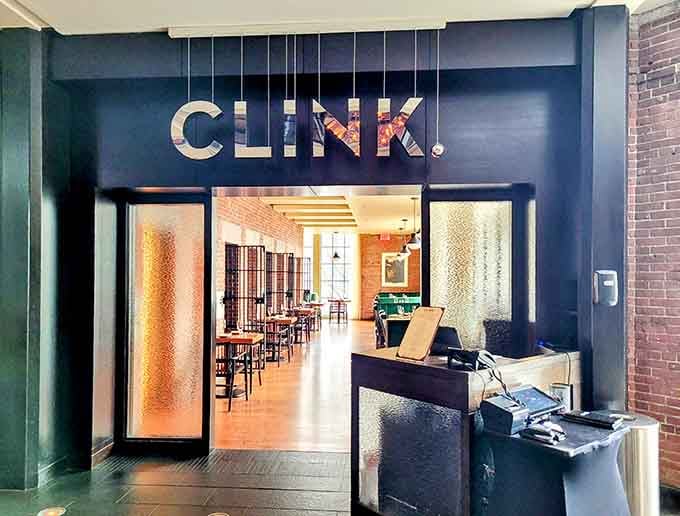 The modern entrance glows with inviting warmth, proving that old jails can definitely get a second chance.