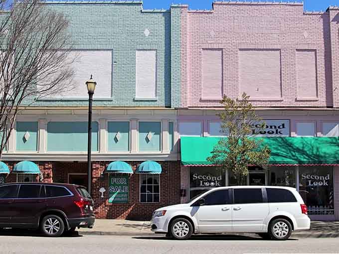 Pastel storefronts and vintage awnings create a Main Street that looks sweeter than a box of saltwater taffy.