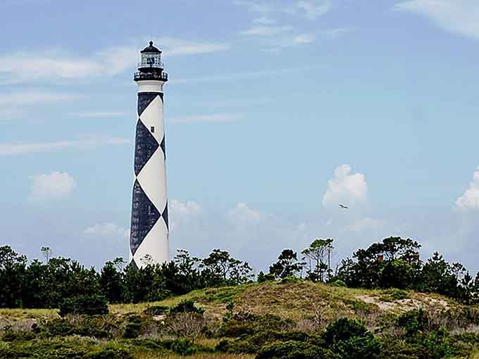 Standing tall against wispy clouds, Cape Lookout's distinctive spirals make it the most photogenic lighthouse on the Outer Banks.