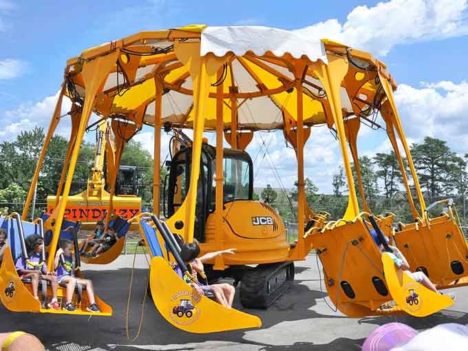 This spinning excavator carousel proves that heavy machinery and pure joy make surprisingly perfect partners together.
