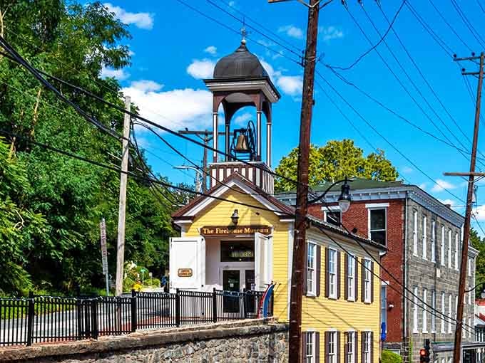 That yellow firehouse with its proud bell tower stands ready like a Norman Rockwell painting come to life.
