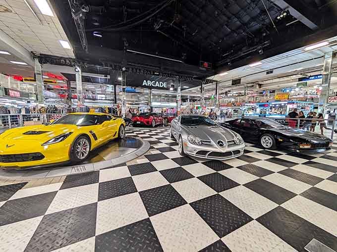 That checkered floor and those dream cars create a showroom vibe that'll make your heart race faster than retirement.
