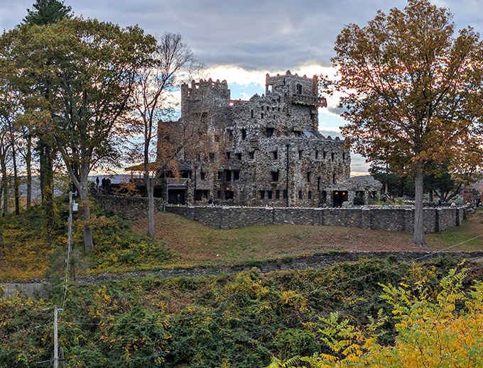 Autumn transforms the castle grounds into a tapestry of russet and gold framing those medieval towers.