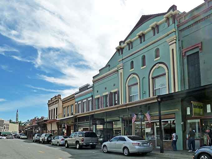 Those turquoise buildings pop against blue skies like a vintage postcard you'd actually want to visit.