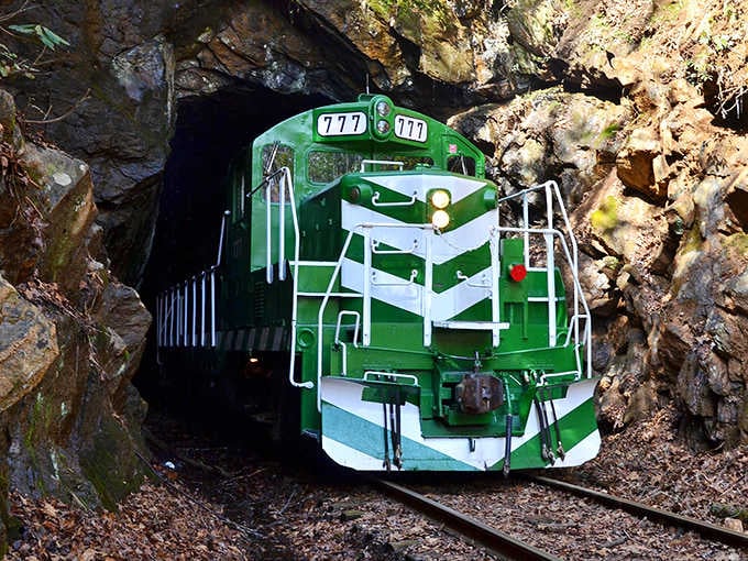 Emerging from the tunnel like a scene from an old Western, this train knows how to make an entrance.