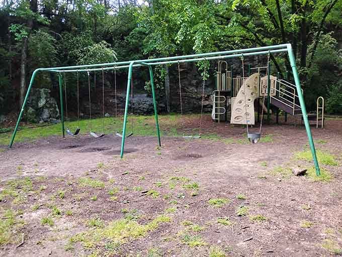 Those vacant swings sway gently in the breeze, waiting for children who may never return.