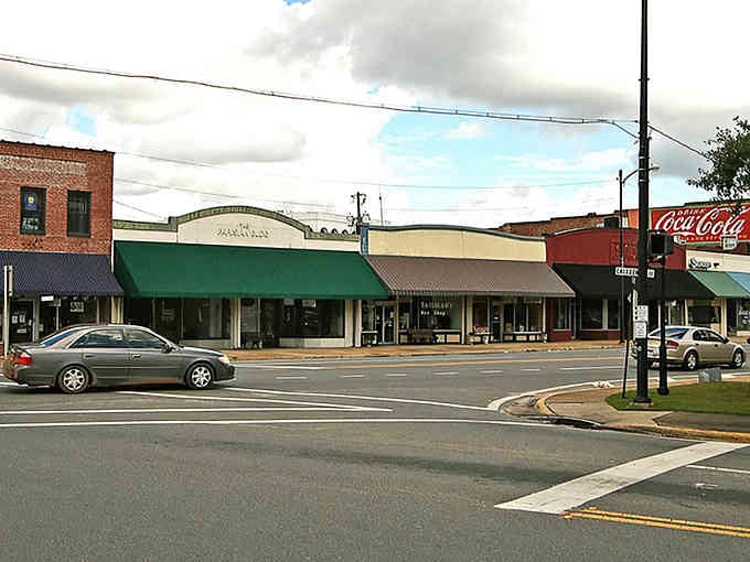 Classic storefronts line the street where neighbors still know each other's names and wave hello every morning.