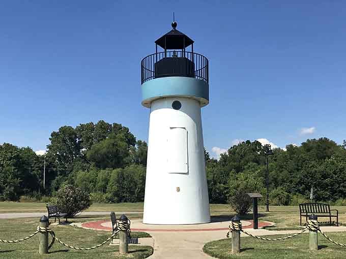 Rope posts and benches frame this riverside beacon perfectly, inviting you to sit and watch the water roll by.