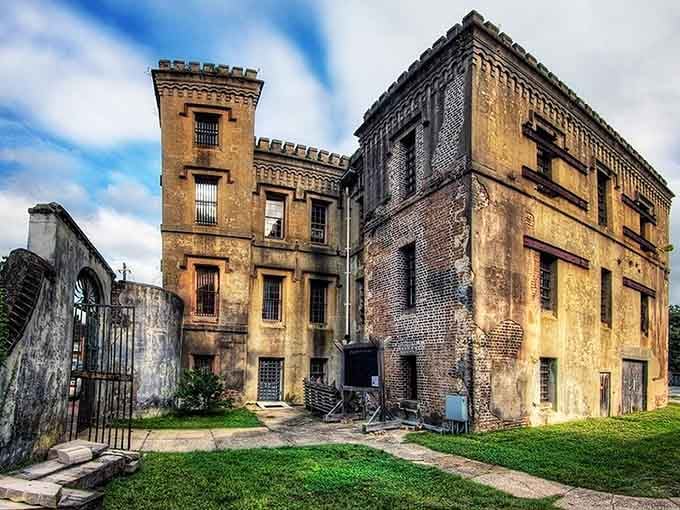 The tower stands sentinel over crumbling brick, a reminder that even the strongest walls eventually tell their stories.