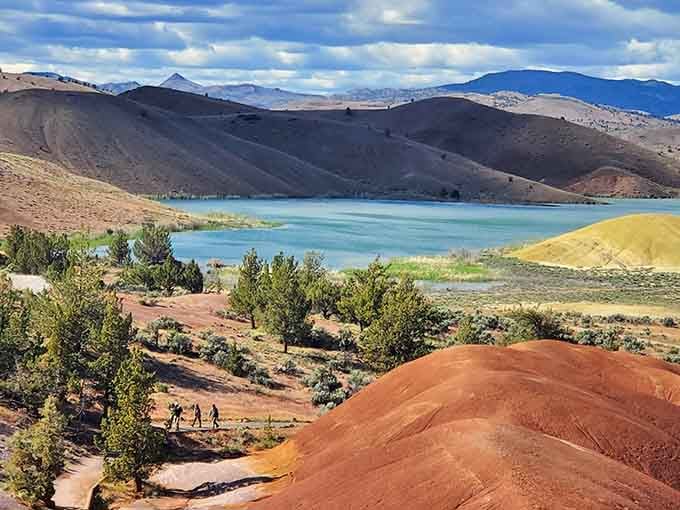 That turquoise lake nestled among rainbow-colored hills proves Oregon does desert landscapes better than anyone expected.