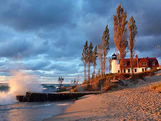 Golden hour waves crash while autumn trees frame this beauty&mdash;nature's own spotlight on a lakeside legend.
