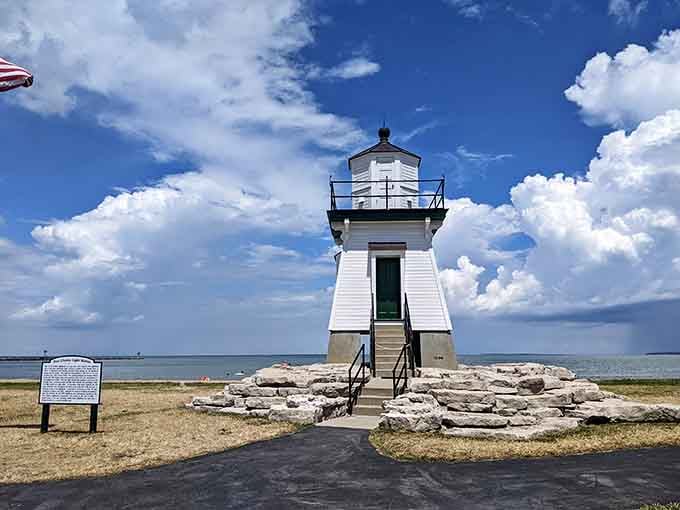 Those puffy clouds frame this classic lighthouse perfectly, making every snapshot look like a professional postcard.