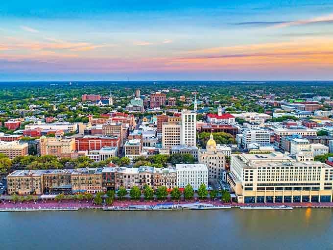 Golden hour paints Savannah's skyline in pastels, where the river meets centuries of Southern charm and hospitality.
