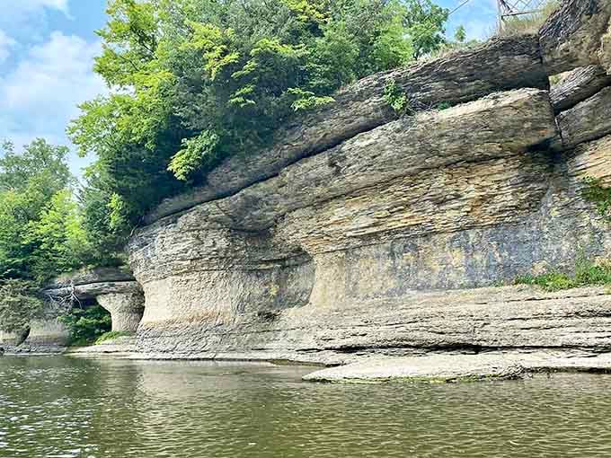 Those layered rock walls rising from the water look like something straight out of an Indiana Jones adventure film.