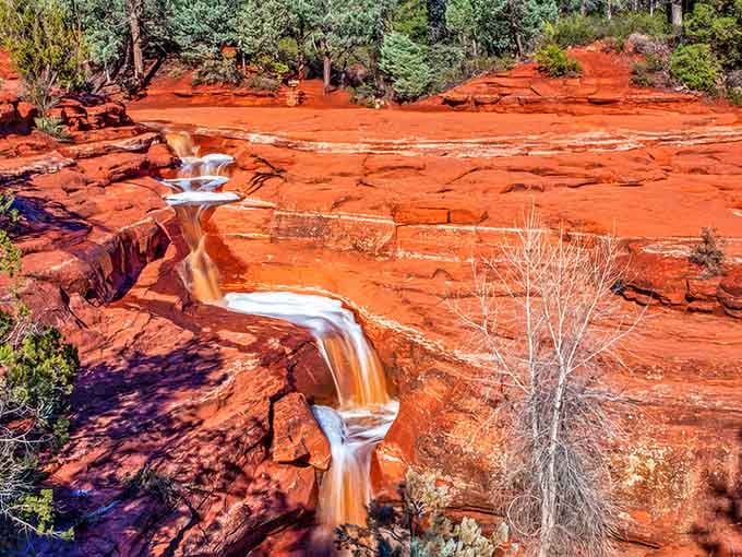Watch the water dance down terraced rock formations, each cascade more mesmerizing than your favorite fountain show.