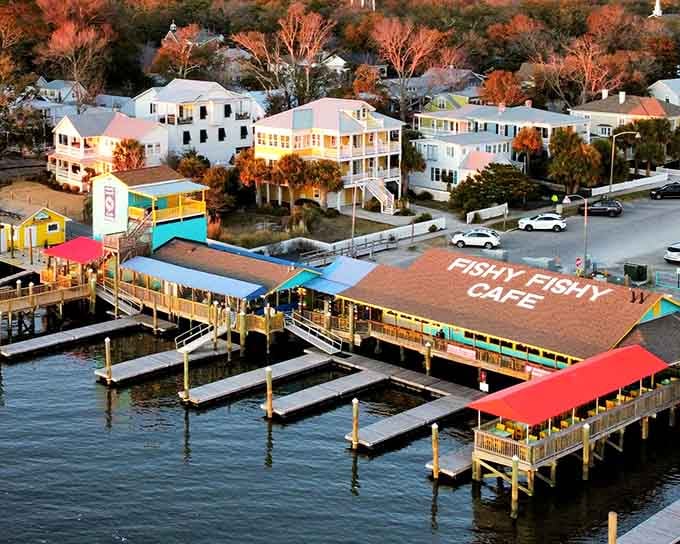 Autumn colors frame this waterfront paradise where colorful docks stretch out like welcoming arms into the harbor.