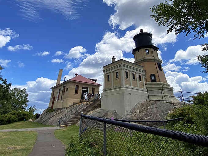 The keeper's dwelling sits beside the tower, a complete lighthouse complex that's more impressive than any postcard suggests.