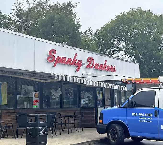 The striped awning and outdoor seating invite you to slow down and savor something sweet in the fresh air.