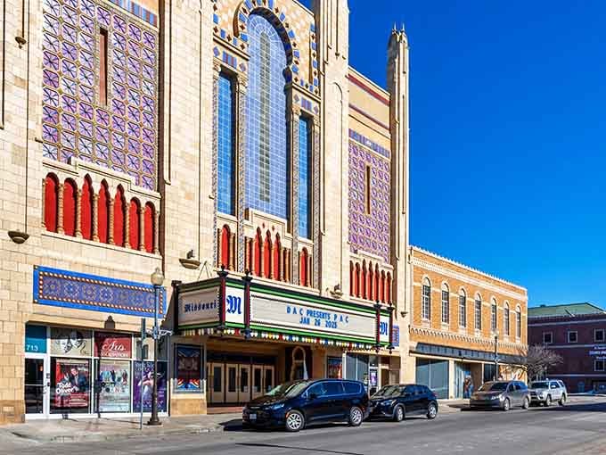 Art deco theater glory meets blue sky perfection, like stepping onto a Hollywood backlot right in Missouri.