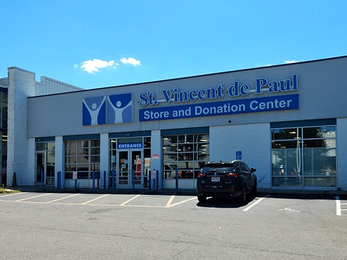 Blue skies and bright signage promise a day of discovering hidden gems at unbeatable prices.