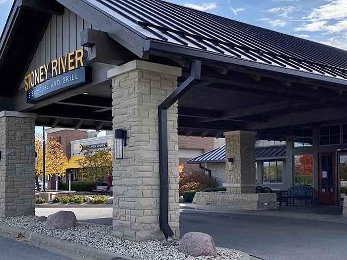 Stone pillars and autumn colors frame the entrance like nature's own welcome mat to beef paradise.
