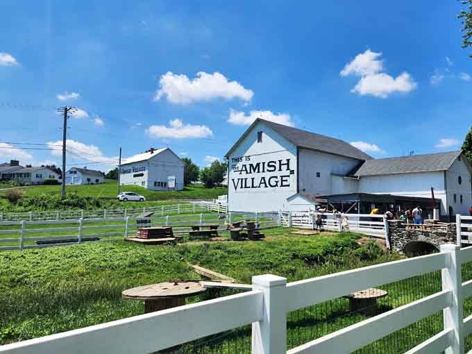 White fences, green pastures, and blue skies create a postcard scene that reminds you simplicity still exists somewhere.