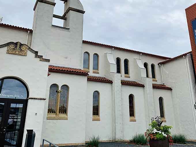 This converted church building with its terra cotta roof tiles whispers stories from another continent entirely.