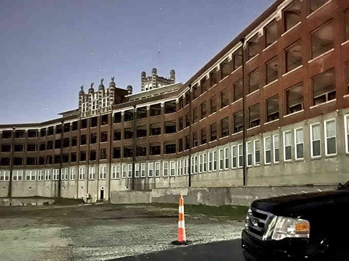 Even in twilight's purple haze, those countless dark windows seem to peer back at you with centuries of untold stories.