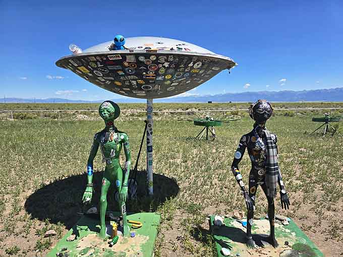 These cosmic greeters sport stickers and personality, waiting patiently for visitors who believe the truth is out there.