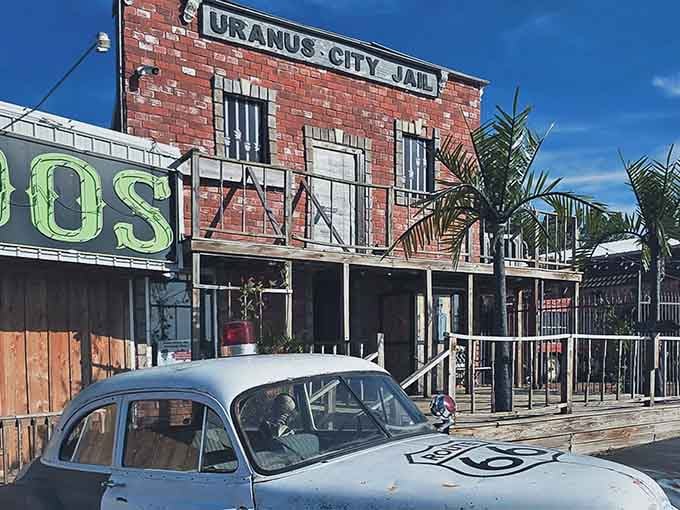 The Old West meets modern roadside kitsch at this wonderfully absurd town complete with jail and vintage car charm.