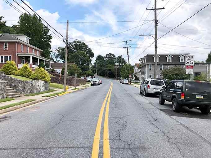 Small-town streets where the speed limit is suggestions and the real traffic jam involves antique shoppers.