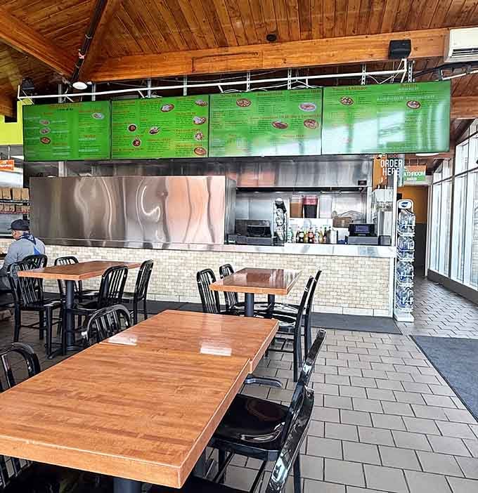 Clean lines and warm wood create an inviting space where the food takes center stage, exactly as it should.