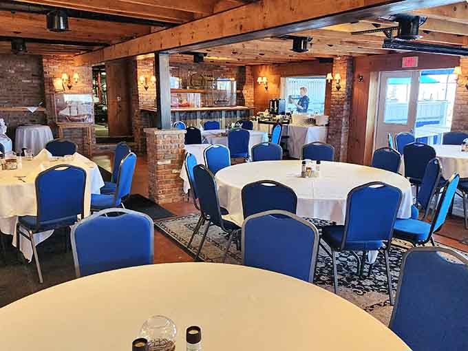 Exposed brick and wooden beams create an atmosphere that whispers maritime history while you contemplate your seafood choices with serious intent.