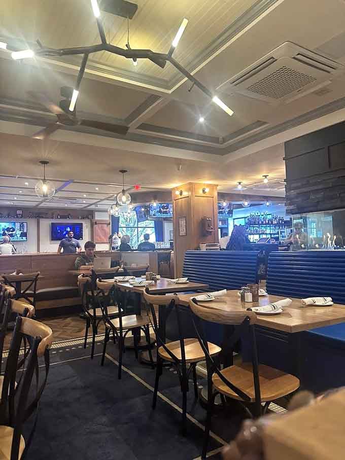 Modern tavern meets neighborhood comfort in a space where everyone looks good under these flattering lights.