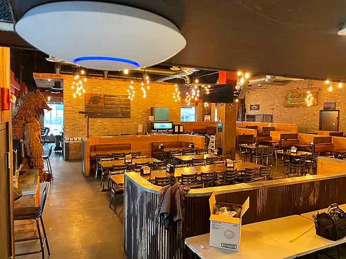 String lights and exposed brick create an atmosphere where comfort food meets contemporary style, no pretension required.