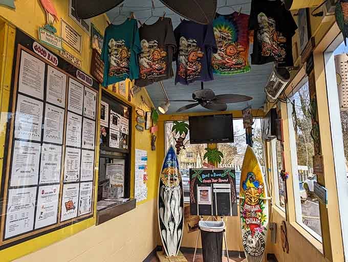 Surfboards and sunshine-yellow walls transport you straight to the beach, proving paradise doesn't require an ocean view after all.