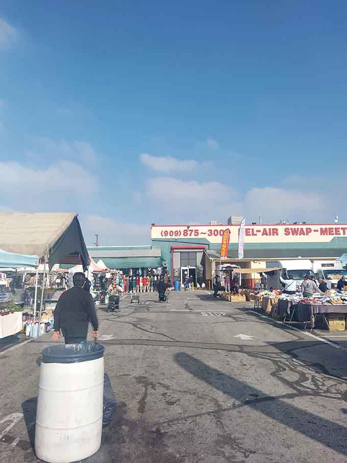 The iconic Bel-Air Swap Meet entrance welcomes bargain hunters like a beacon of hope for your wallet's survival.