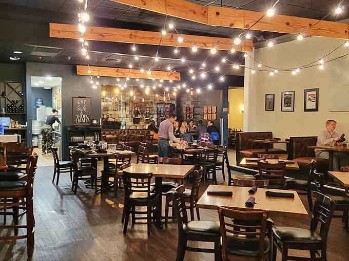 String lights and exposed beams create an atmosphere that's equal parts rustic charm and modern sophistication.