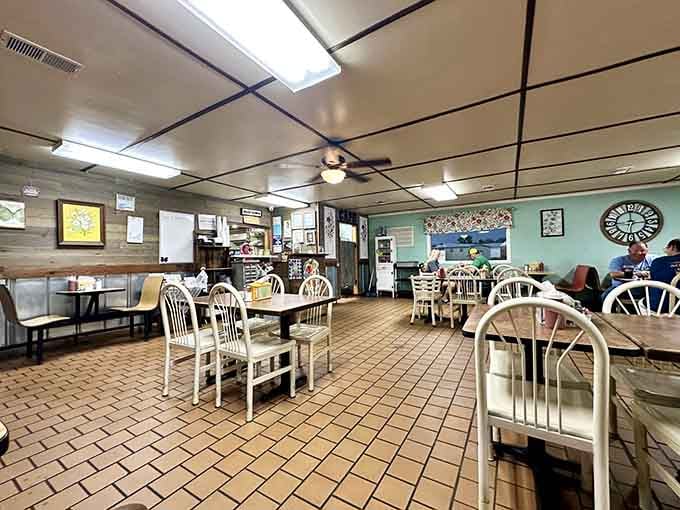 Classic diner vibes with tile floors and mismatched seating that says "relax, you're among friends here."