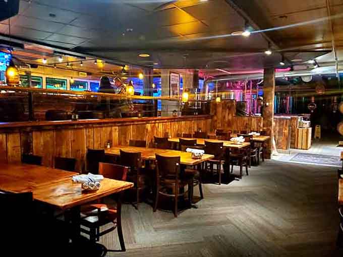 Wood, warm lighting, and lake views create an atmosphere that's equal parts rustic lodge and modern sophistication.