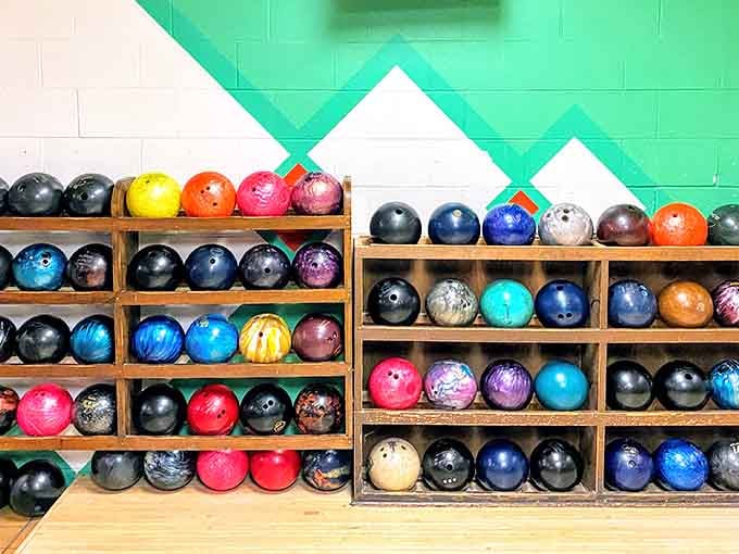 Look at that rainbow of bowling balls lined up like candy in a vintage shop window.