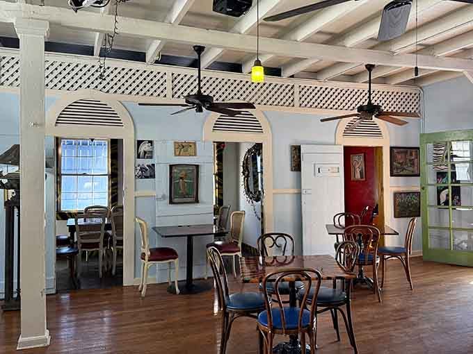 Mismatched chairs and local art create the vibe of your coolest friend's living room, except the coffee's better.